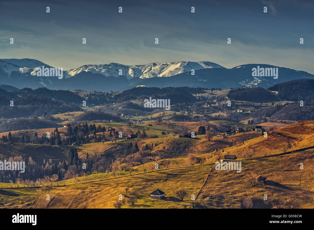 Rural landscape in the valleys of Bucegi mountains uphill in Sirnea ...