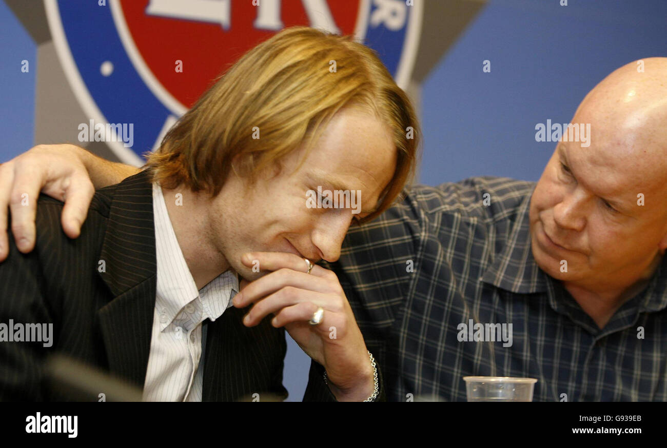 An emotional David Cochrane, 25, is comforted by his uncle Mike ...