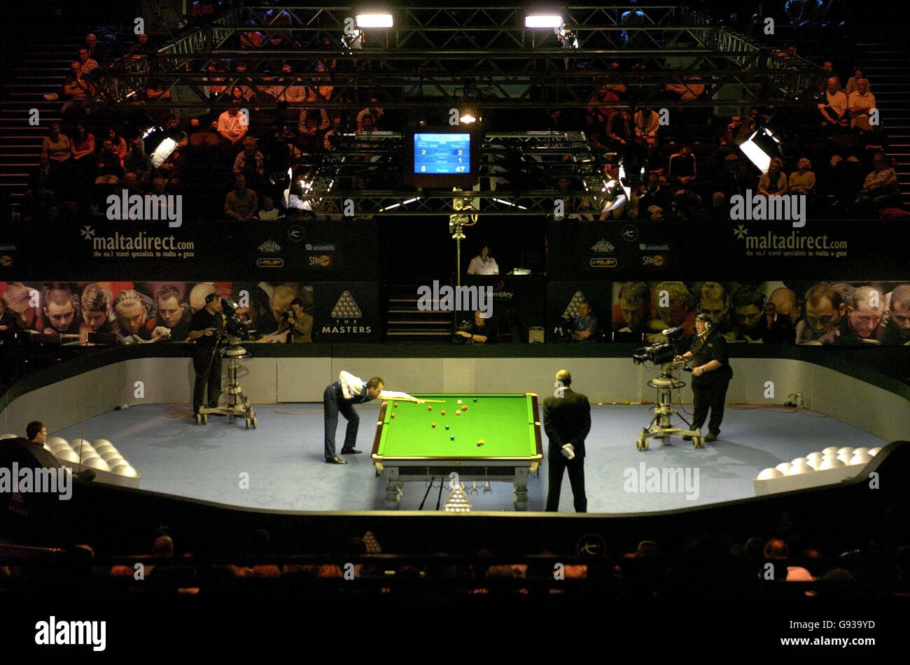 Scotland's John Higgins in action against England's Jimmy White during ...