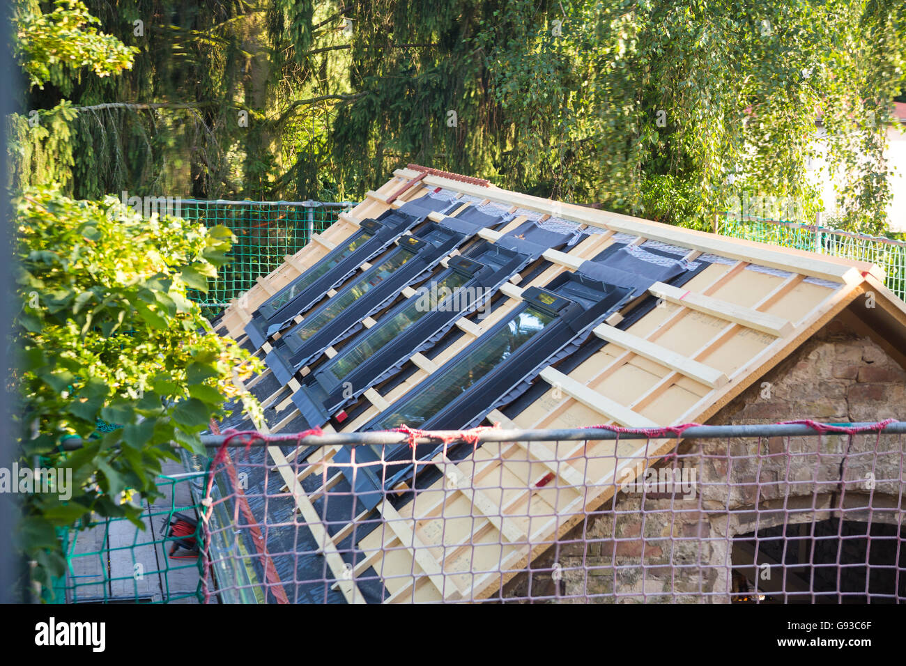 New roof coverings windows Stock Photo - Alamy