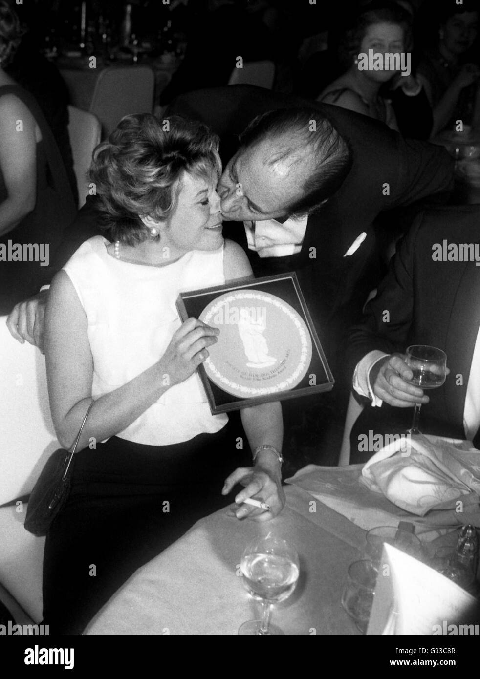 Actor rex hamilton kisses his wife hi-res stock photography and images ...
