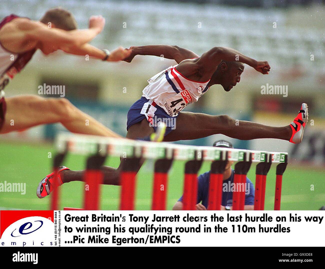 Great Britain's Tony Jarrett clears the last hurdle on his way to ...