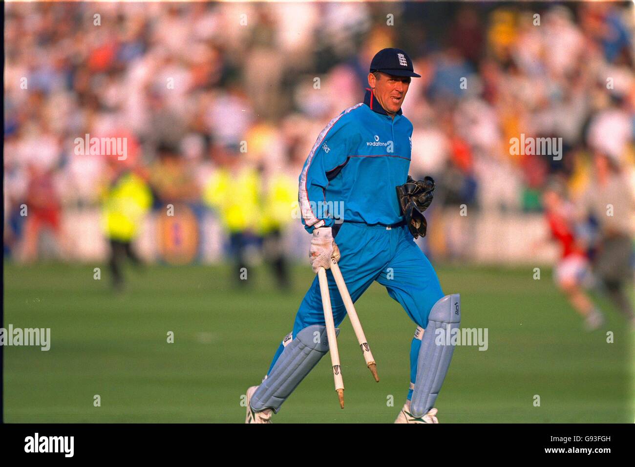 England captain Alec Stewart runs off the pitch with two stumps after ...