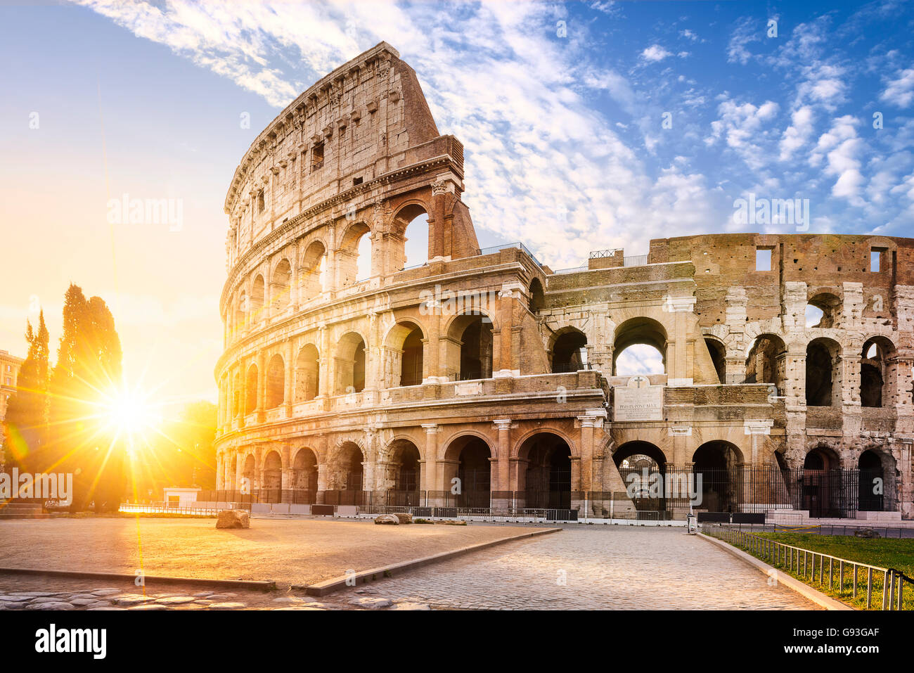 View of Colosseum in Rome and morning sun, Italy, Europe Stock Photo ...