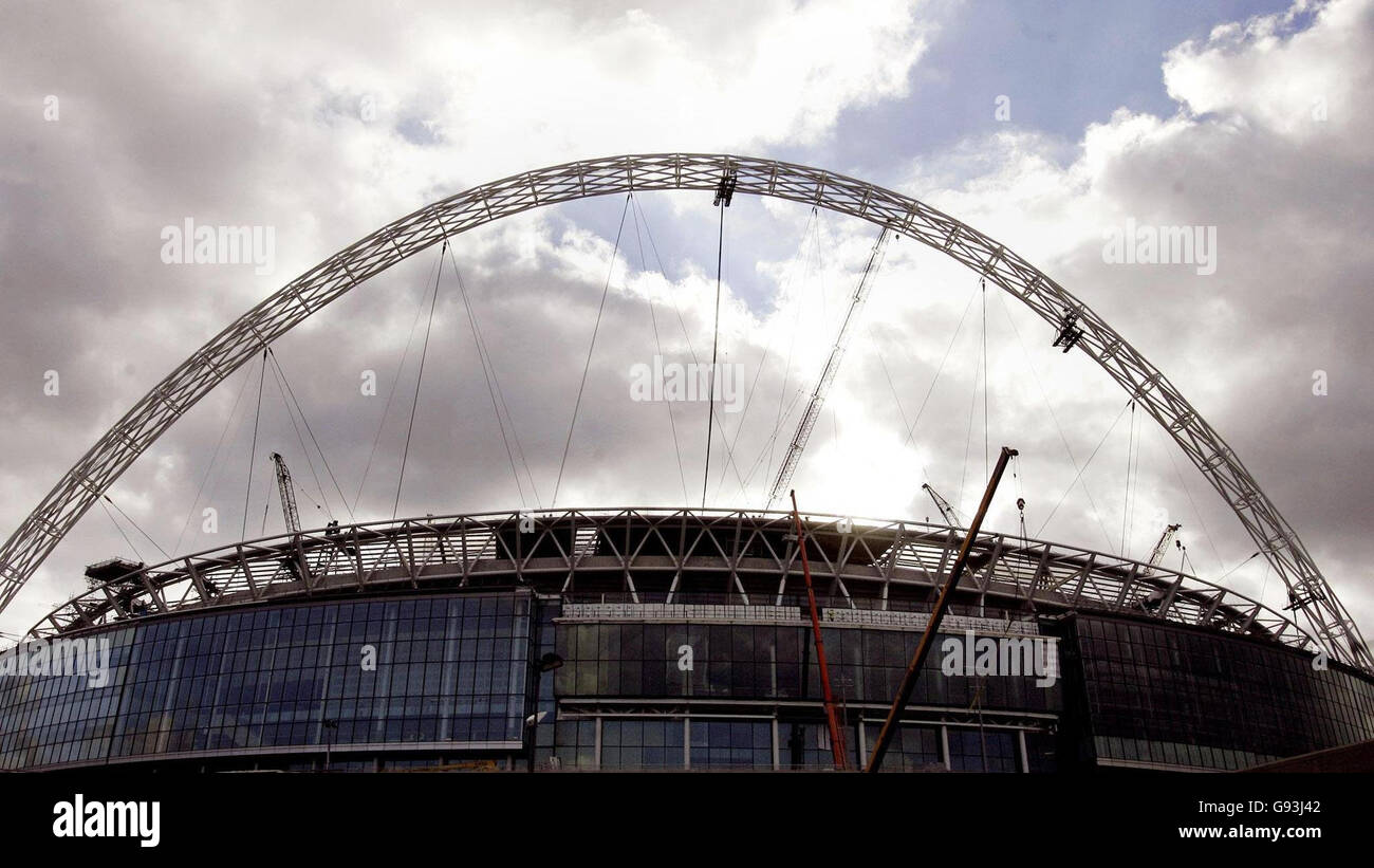General view of the arch of Wembley Stadium silhouetted against the sky ...