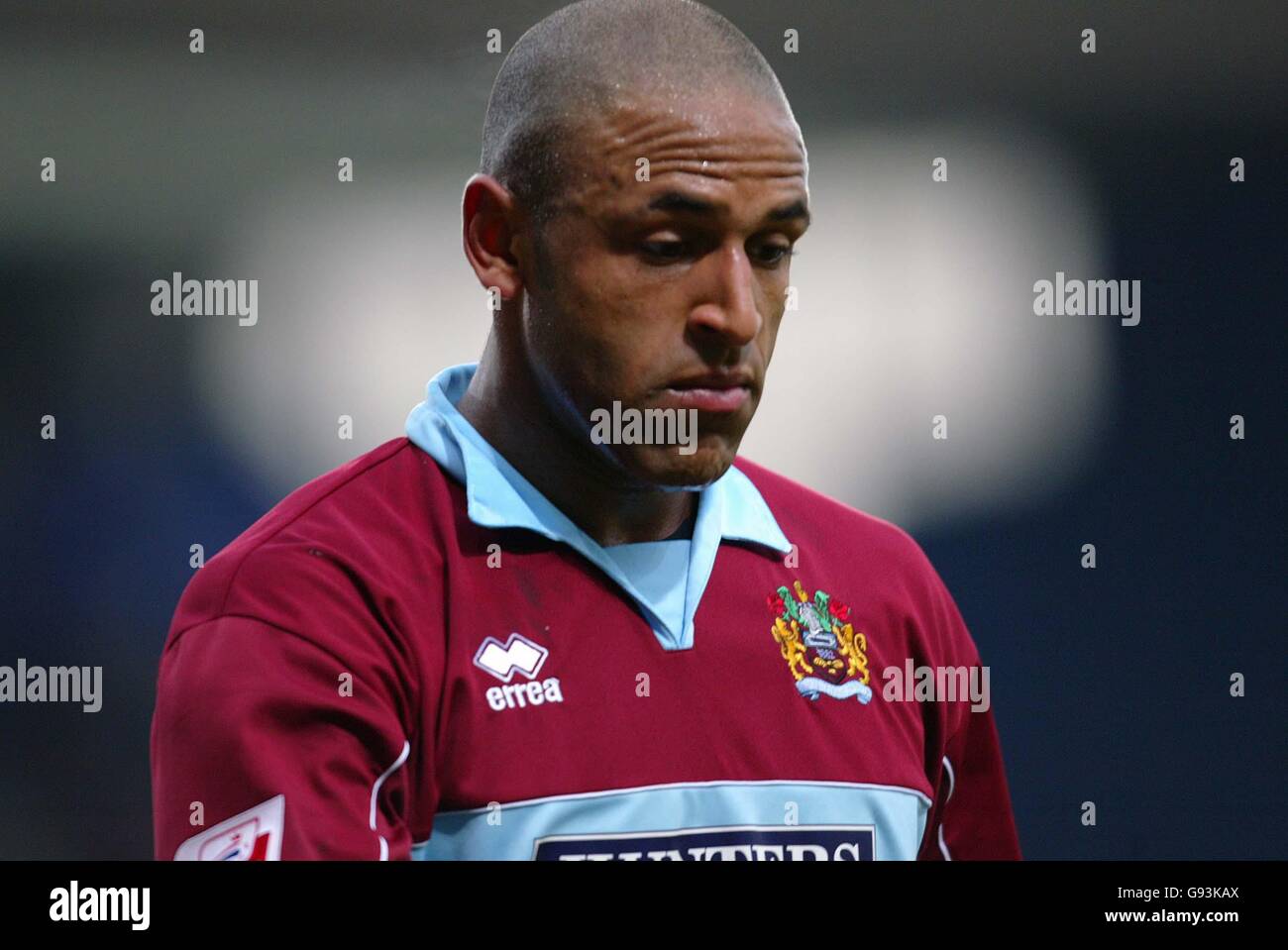 Burnley's Wayne Thomas looks dejected after being sent off against ...