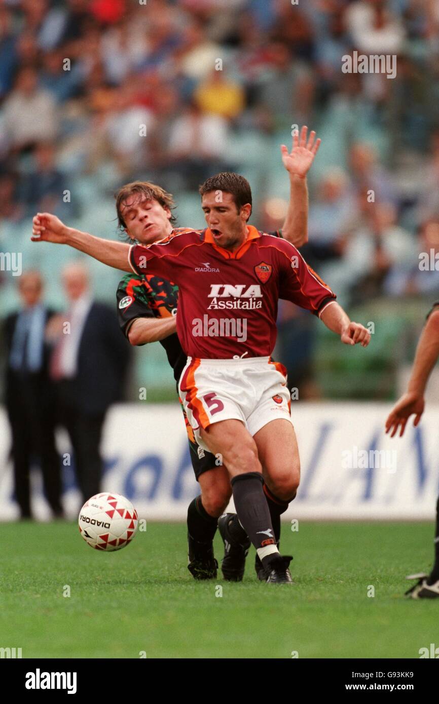 Vincent candela of roma right controls the ball under pressure hi-res ...