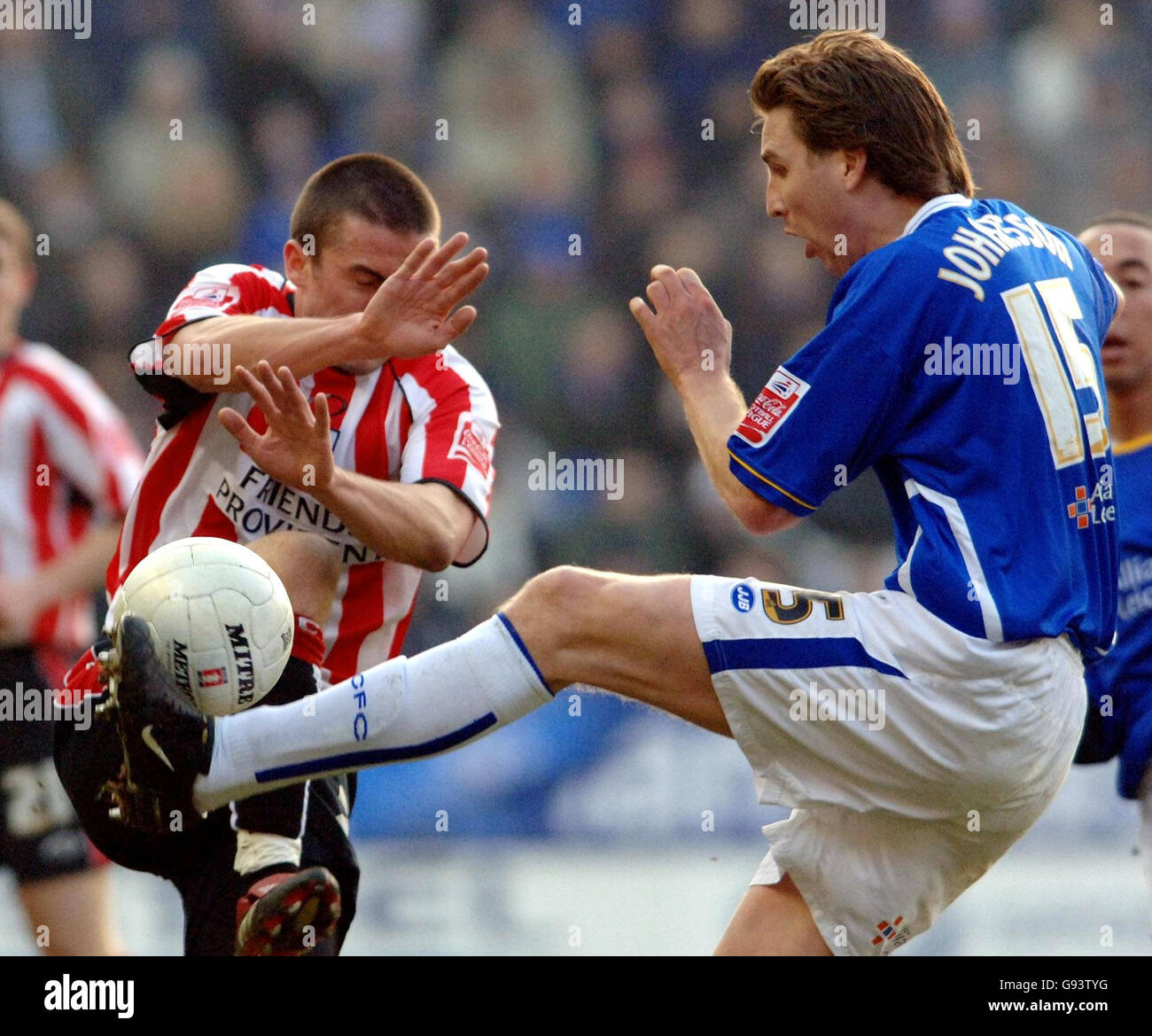 Leicester City's Nils-Eric Johansson (R) battles for the ball with ...