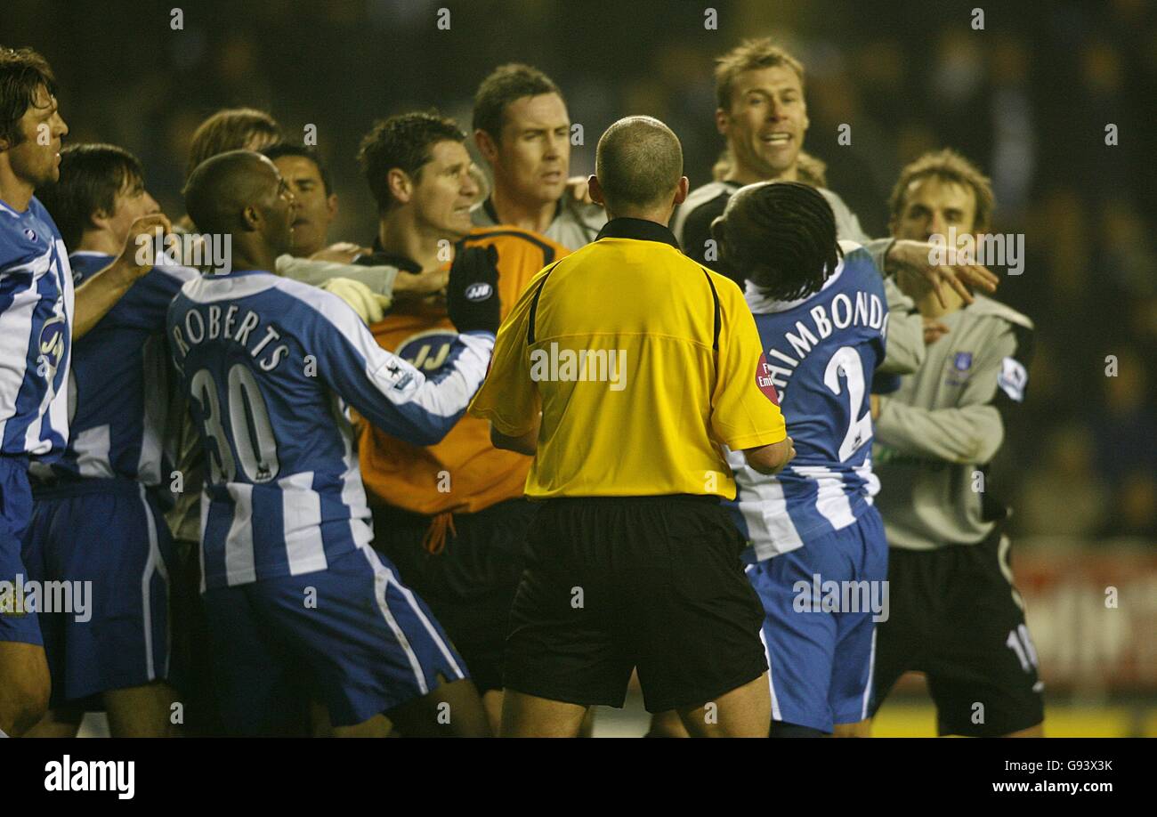 Everton's Duncan Ferguson grapples with Wigan Athletic's Pascal ...