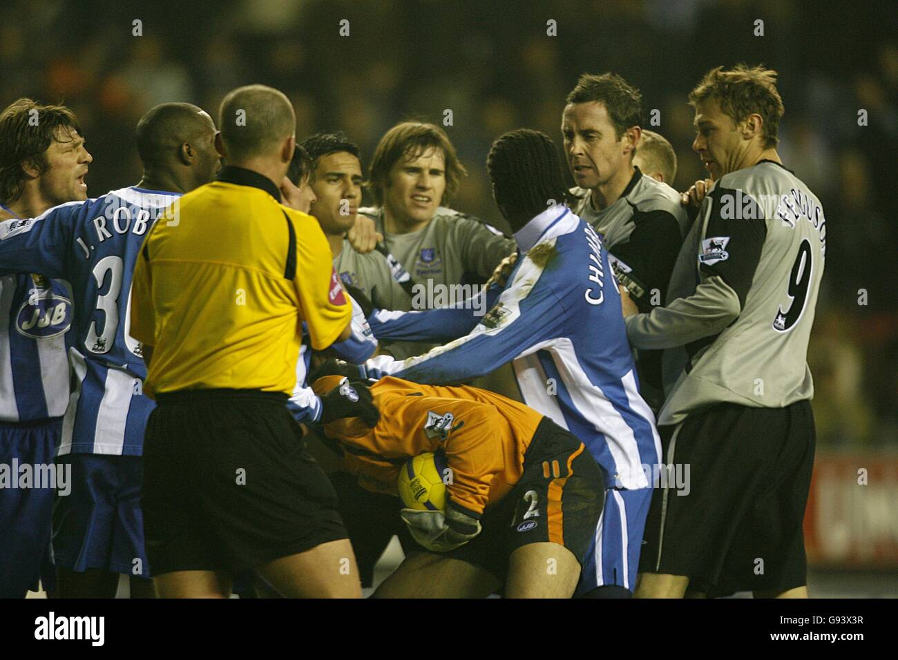 Everton's Duncan Ferguson grapples with Wigan Athletic's Pascal ...
