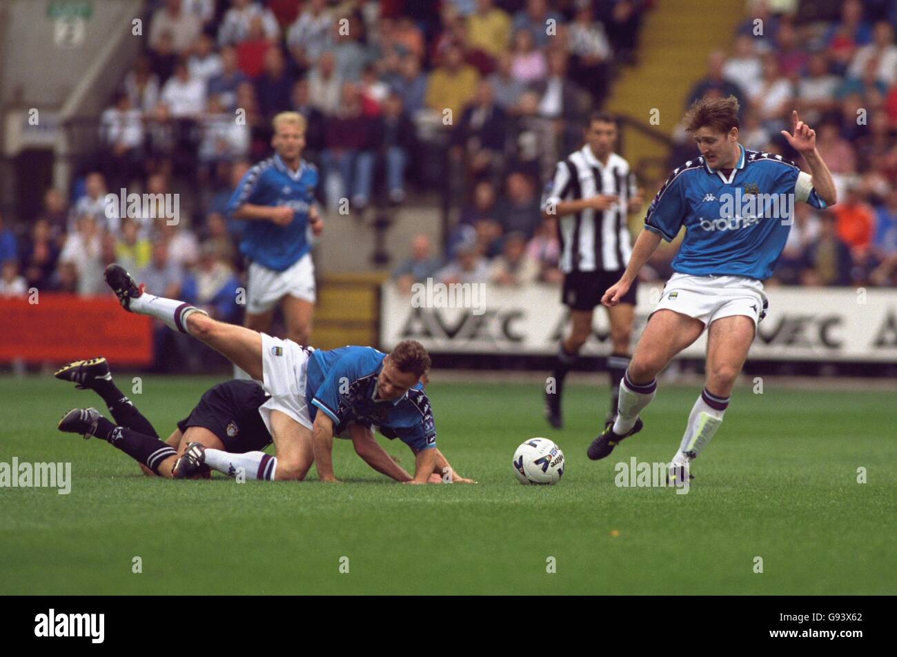 Notts County's Gary Owers Manchester City's Paul Dickov fall to the ...