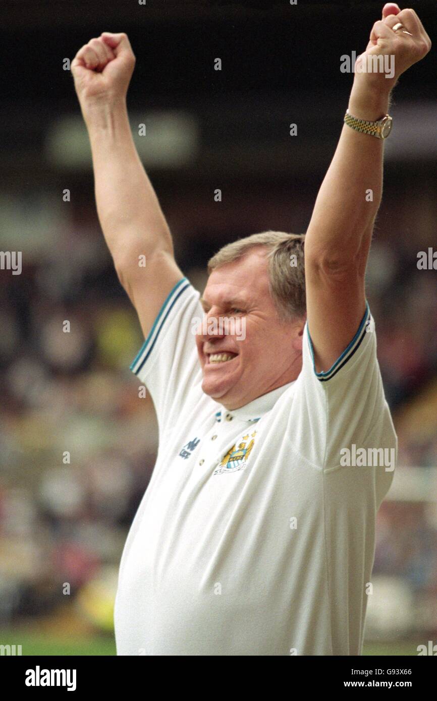 Manchester City's ManagerJoe Royle raises his arms in relief after the ...