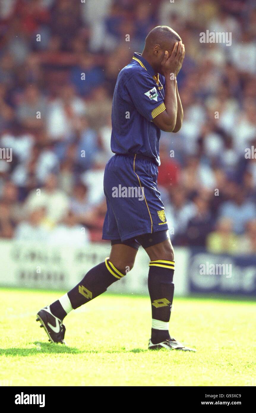 Marcus Gayle of Wimbledon holds his head after missing a chance Stock ...