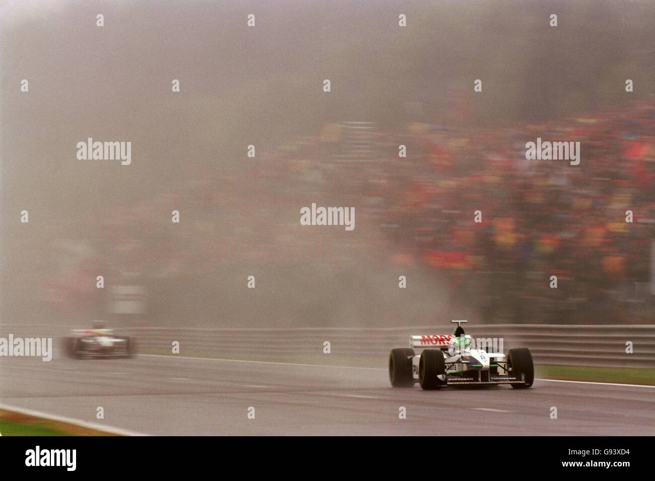 Formula One Motor Racing - Belgian Grand Prix. Tora Takagi leads ...