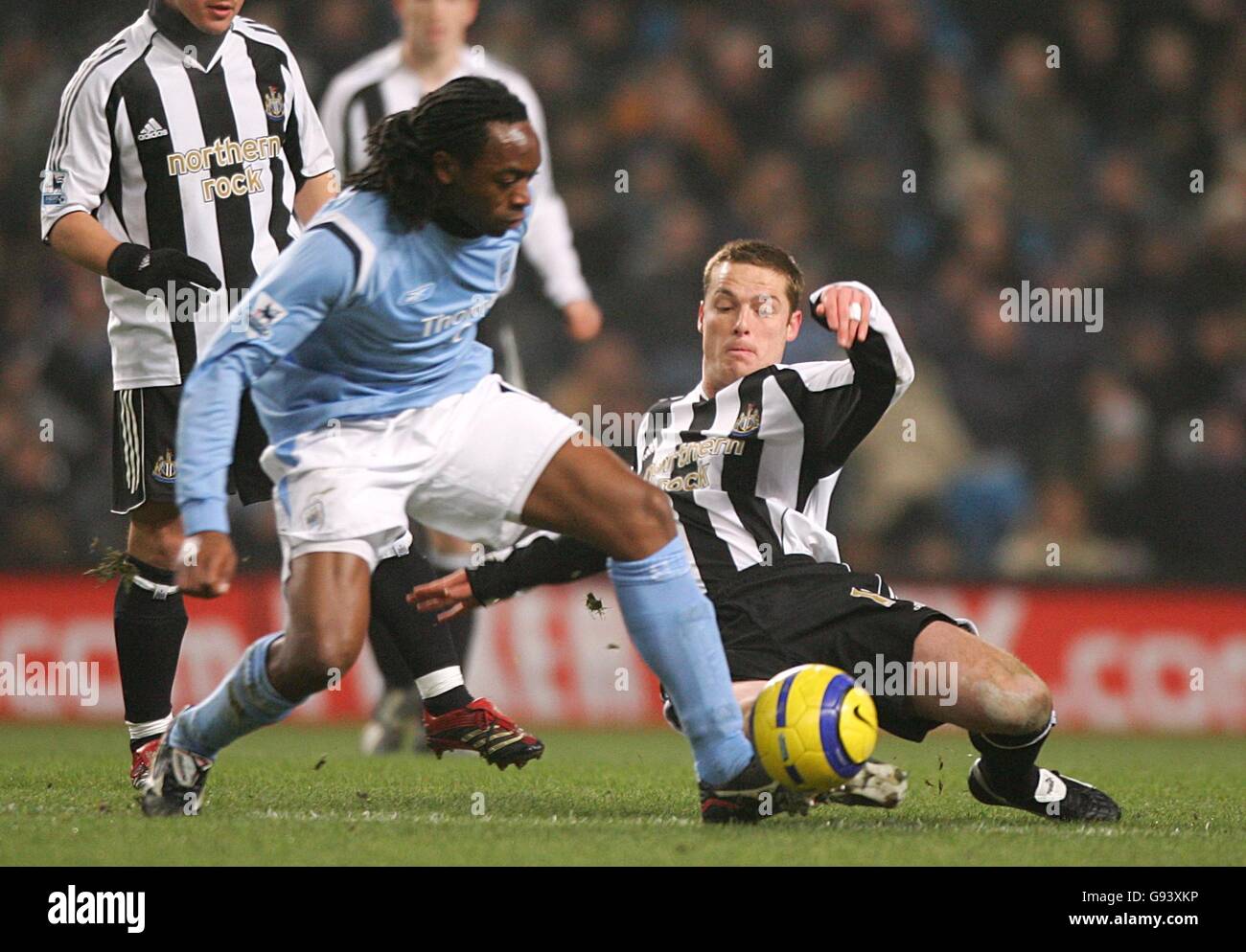 Manchester City's Kiki Musampa is tackled by Newcastle United's Scott ...