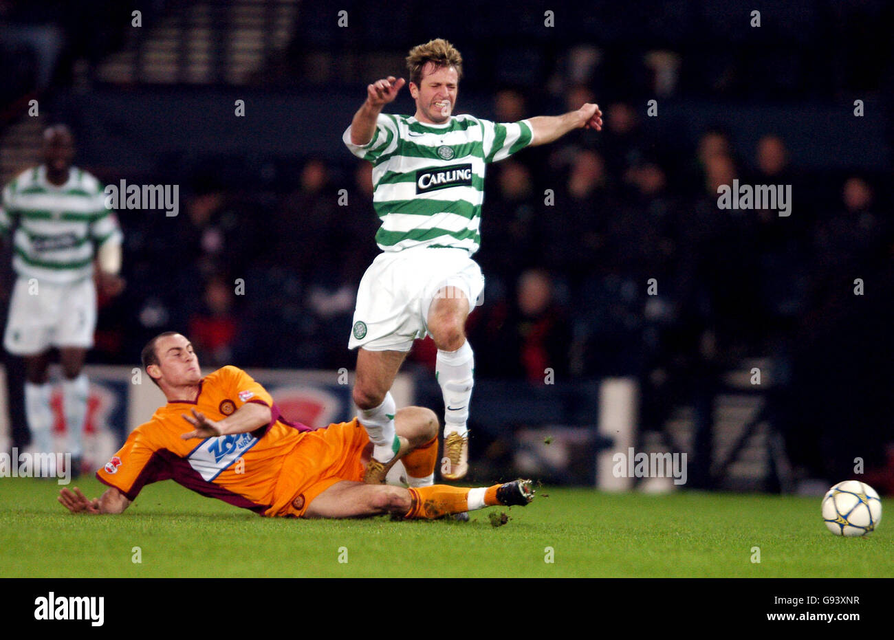 Motherwell's Alan McCormack tackles Celtic's Maciej Zurawski Stock ...