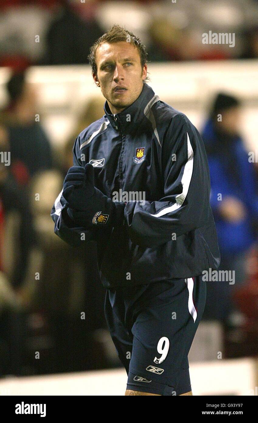 West Ham United's new signing Dean Ashton warms up before the match ...