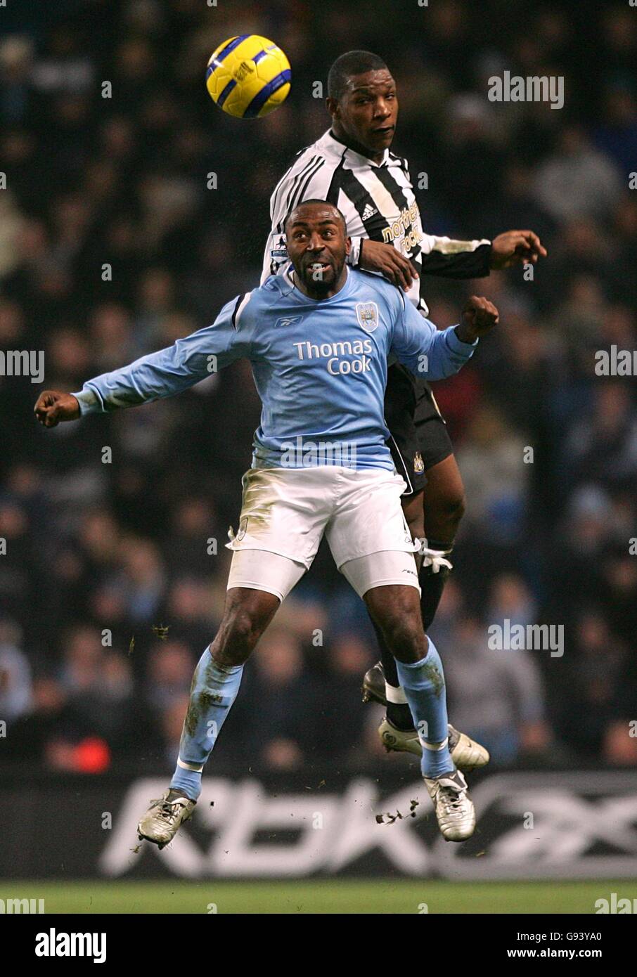 Newcastle United's Titus Bramble gets above Manchester City's Darius ...