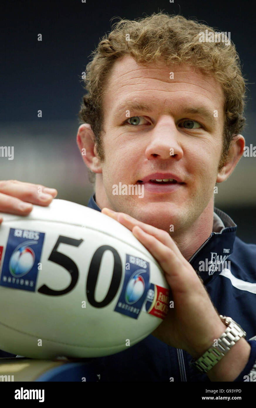 Scotland captain Jason White holds a rugby ball to signify his 50th cap ...