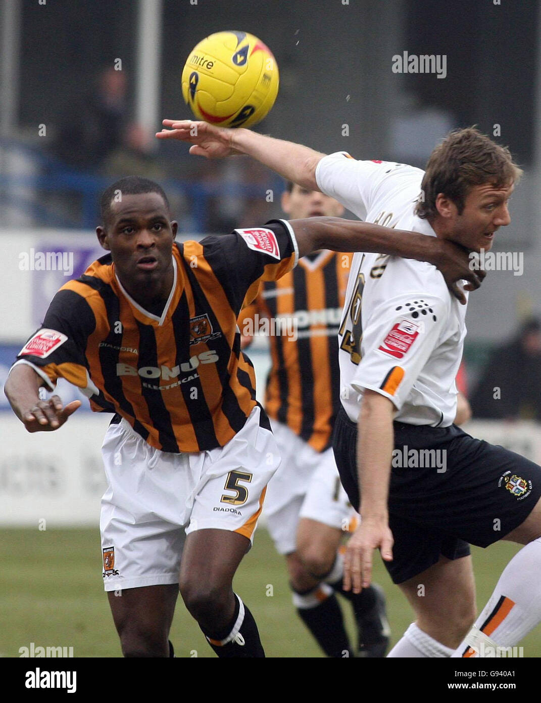 Luton Town's Steve Howard (R) battles with Hull City's Leon Cort during ...