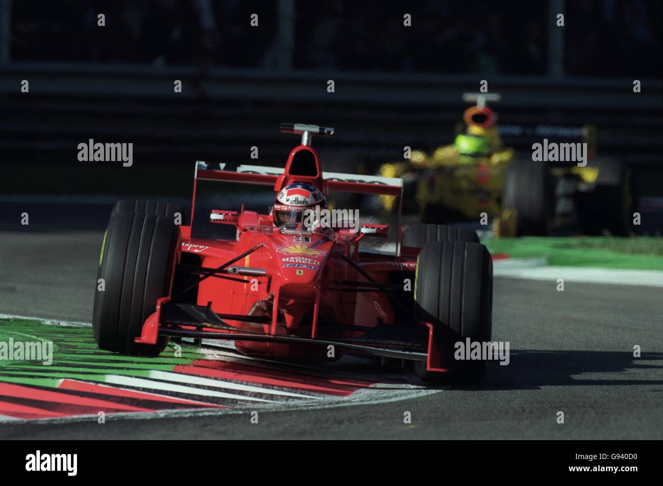 Michael schumacher bounces over monza kerbs leads brother ralf hi-res ...
