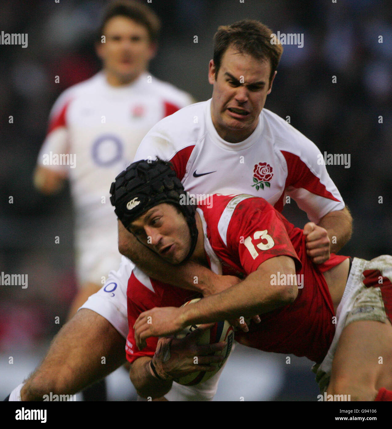 Hal Luscombe of Wales is tackled by Charlie Hodgson of England Stock ...