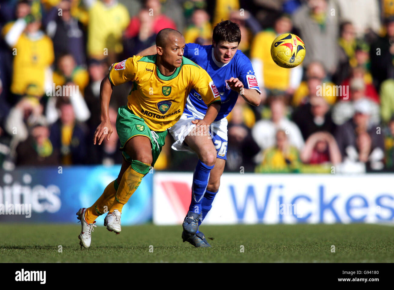 Norwich City's Robert Earnshaw and Ipswich Town's Scott Baron race for ...