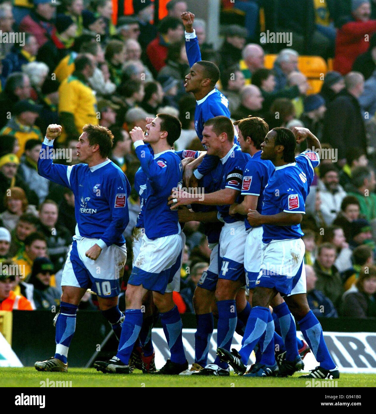 Ipswich Town's Danny Haynes (top) jumps on Jimmy Juan as Ipswich ...
