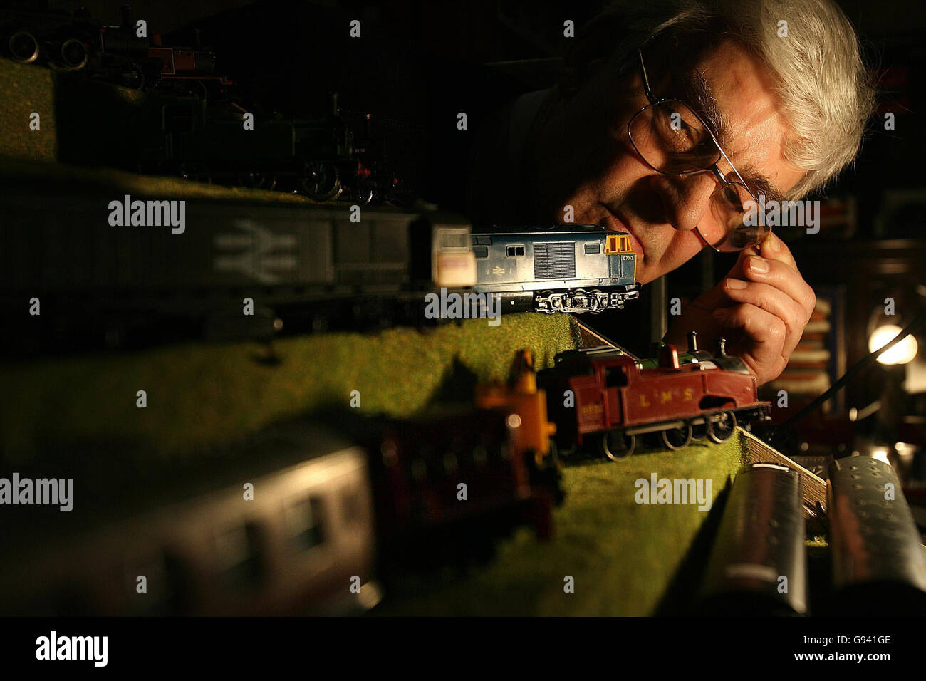 Richard Clark examines toy trains the Toy Collectables Fair, Clontarf ...