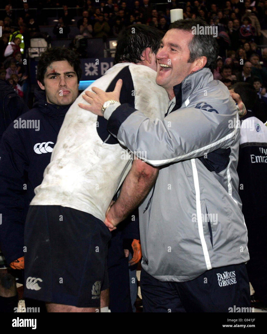 Scotland coach Frank Hadden (R) congratulates Scott Murray after their ...