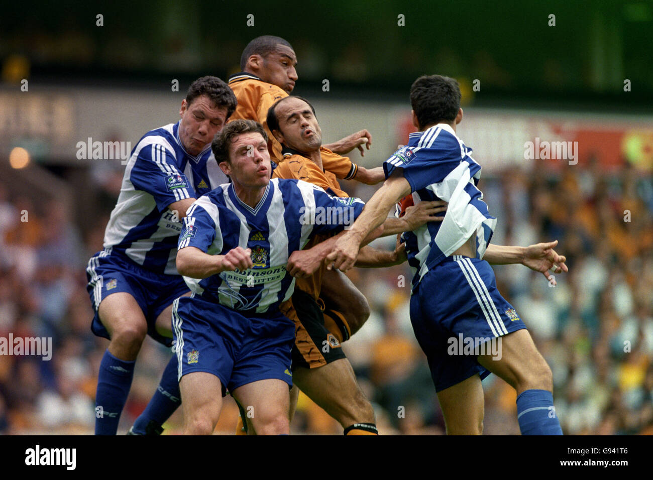 Stockport County's Brett Angell (left), Martin McIntosh (second left ...