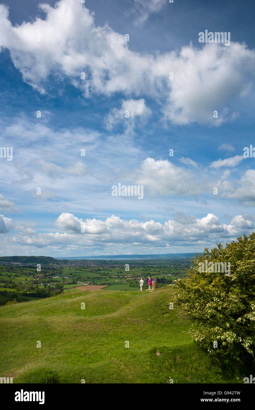 Two people at Coaley Peak viewpoint, the view over The Severn Vale from ...