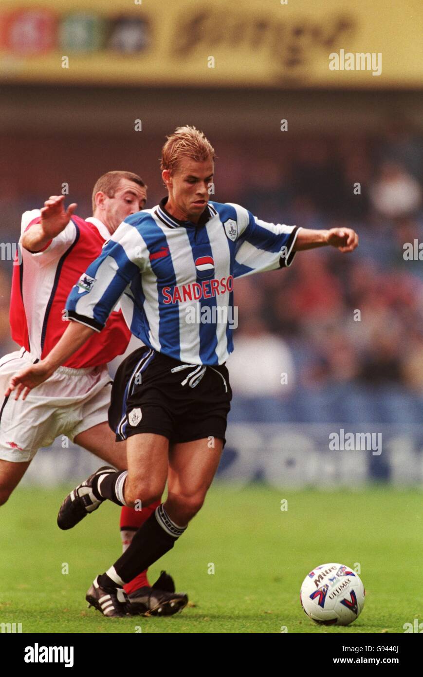 Sheffield Wednesday's Niclas Alexandersson (right) gets away from ...