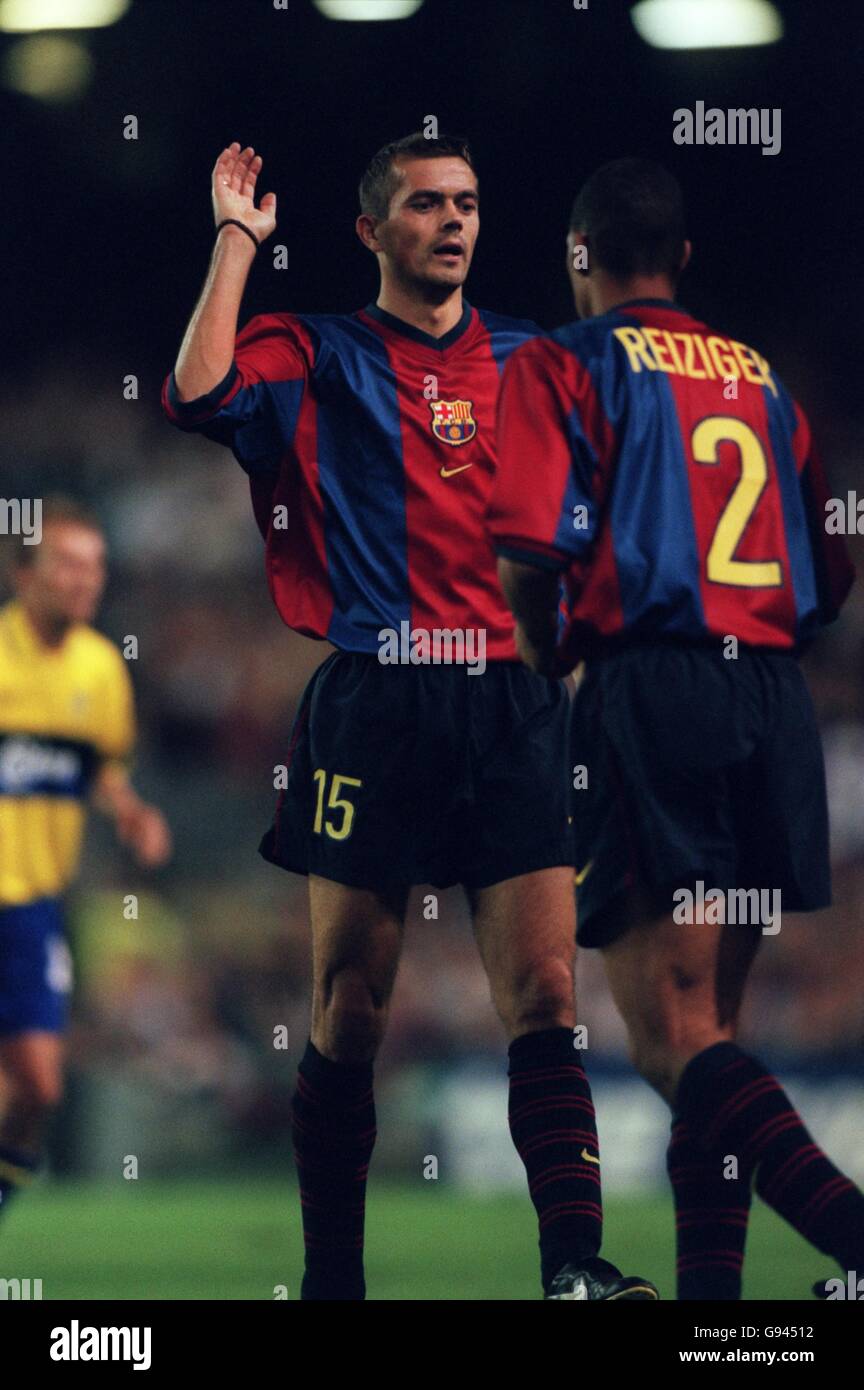 Dutch teammates philip cocu left michael reiziger right of barcelona hi ...