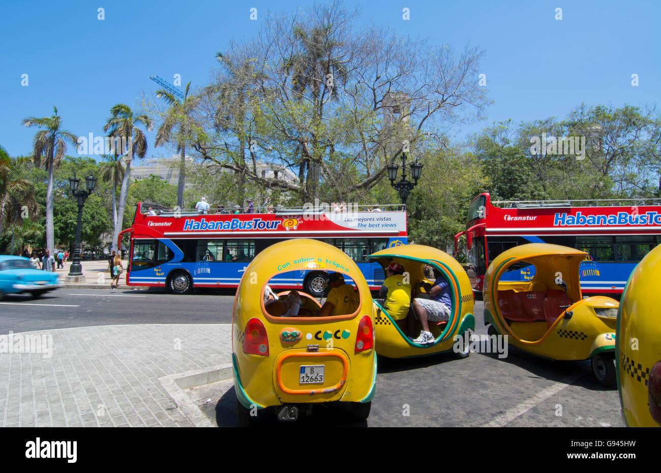 Havana Cuba Habana central colorful coco taxis and tourist bus near ...