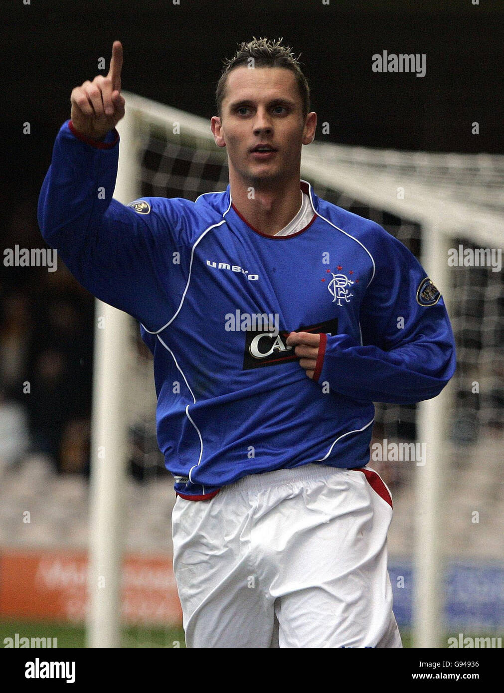 Rangers' Peter Lovenkrands celebrates scoring against Motherwell during ...