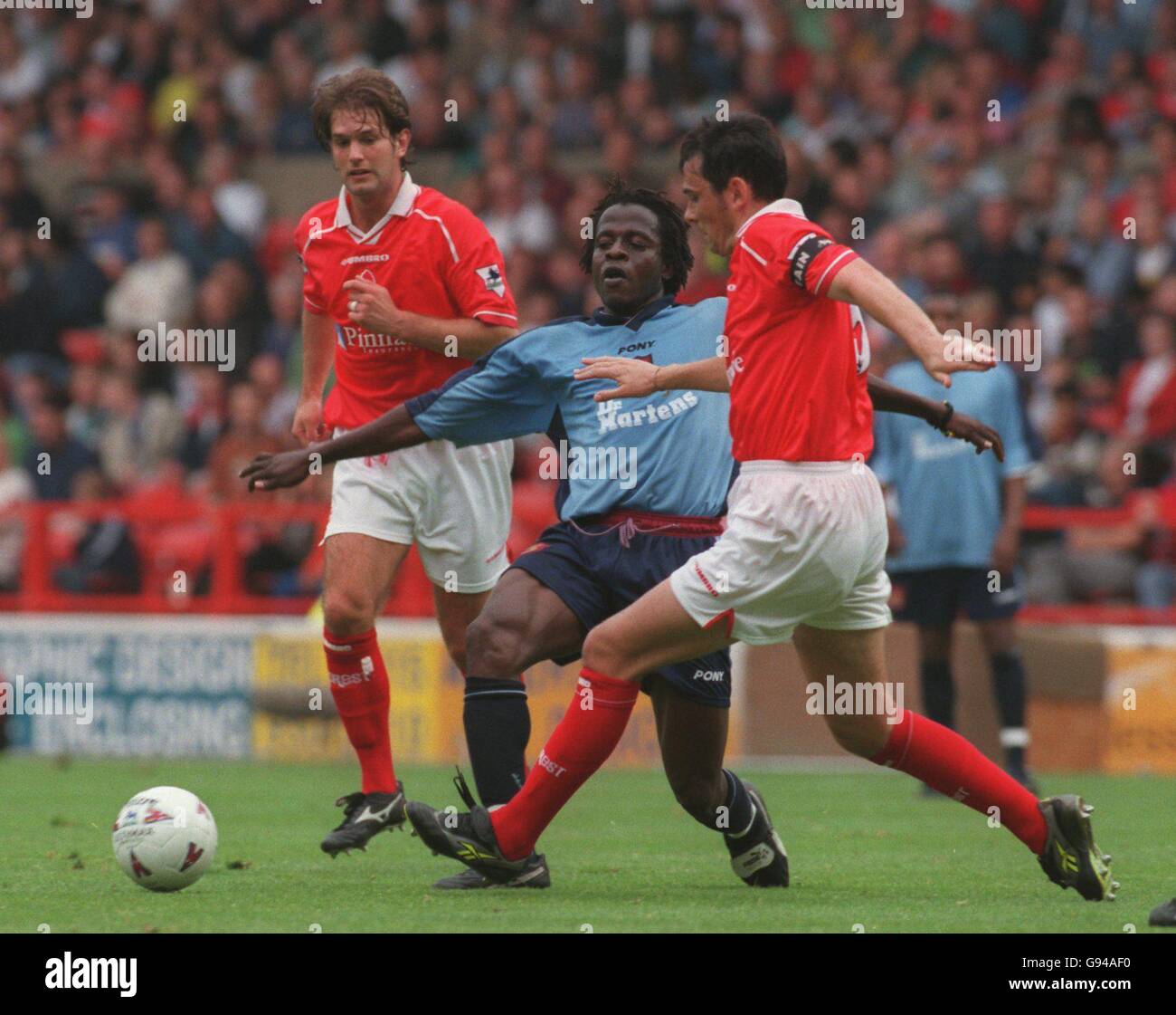 Nottingham Forests Steve Chettle Right Brings The Ball Out Of Defence As Samassi Abou Of West