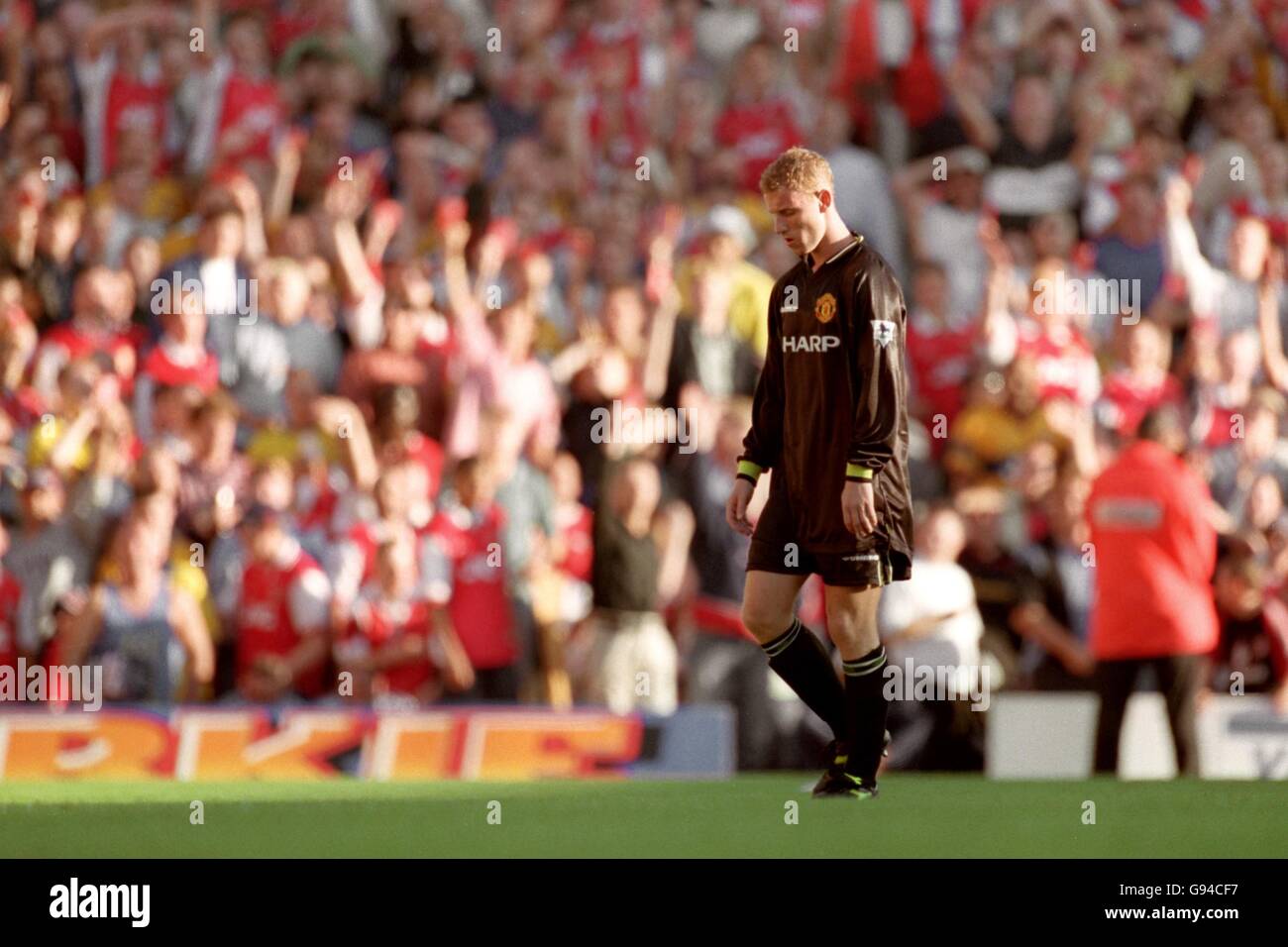 Manchester United's Nicky Butt walks away after being sent off for the ...