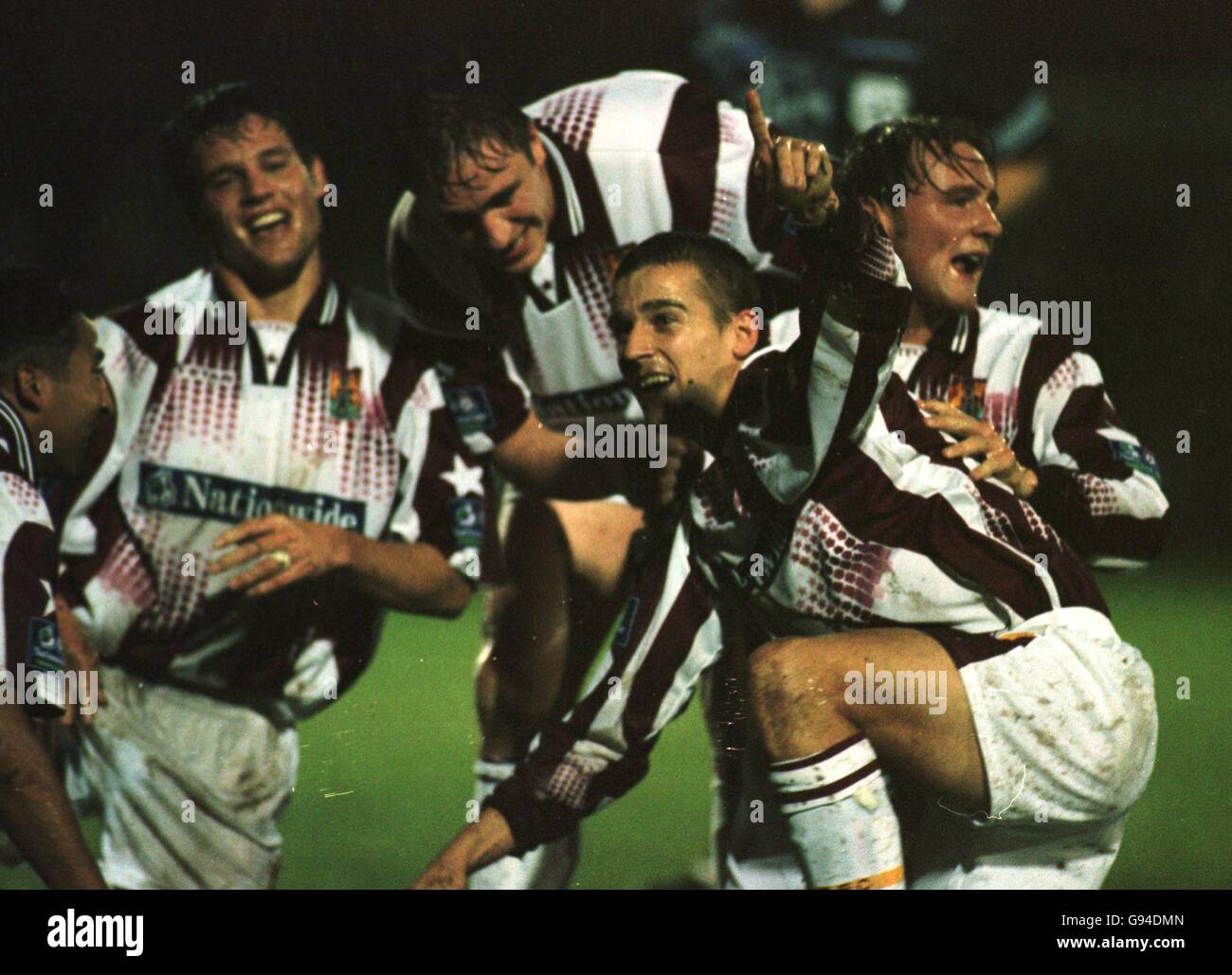 Northampton Town's Sean Parrish (second right) celebrates after scoring ...