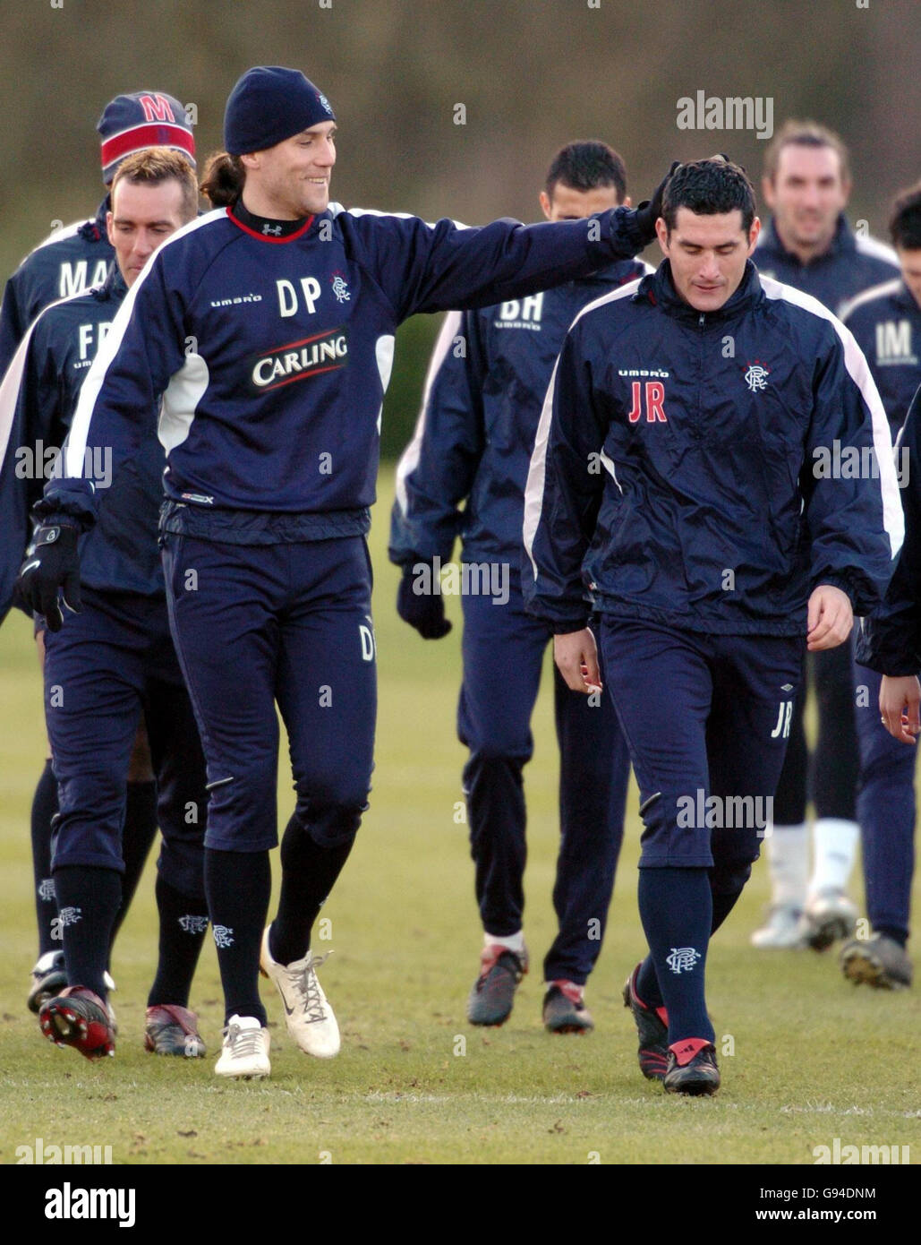 Rangers' Dado Prso pats Julien Rodriguez on the head during a training ...