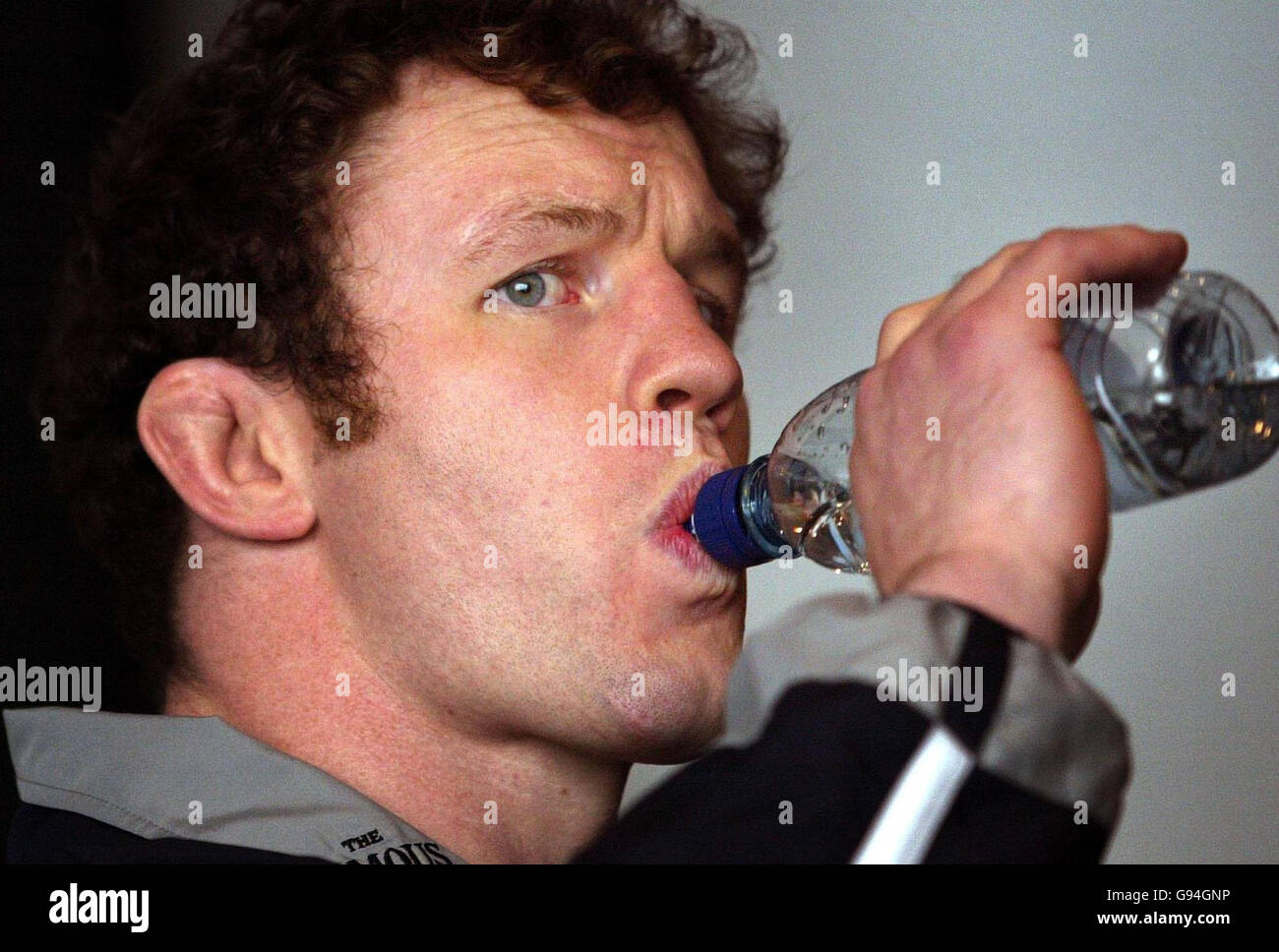 Scotland rugby captain Jason White takes a drink during a press ...