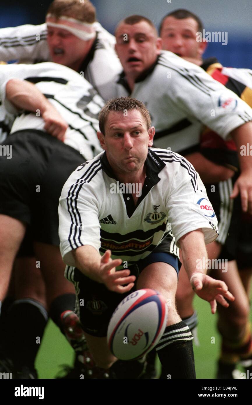 Newcastle scrum half Gary Armstrong releases the ball from the scrum ...
