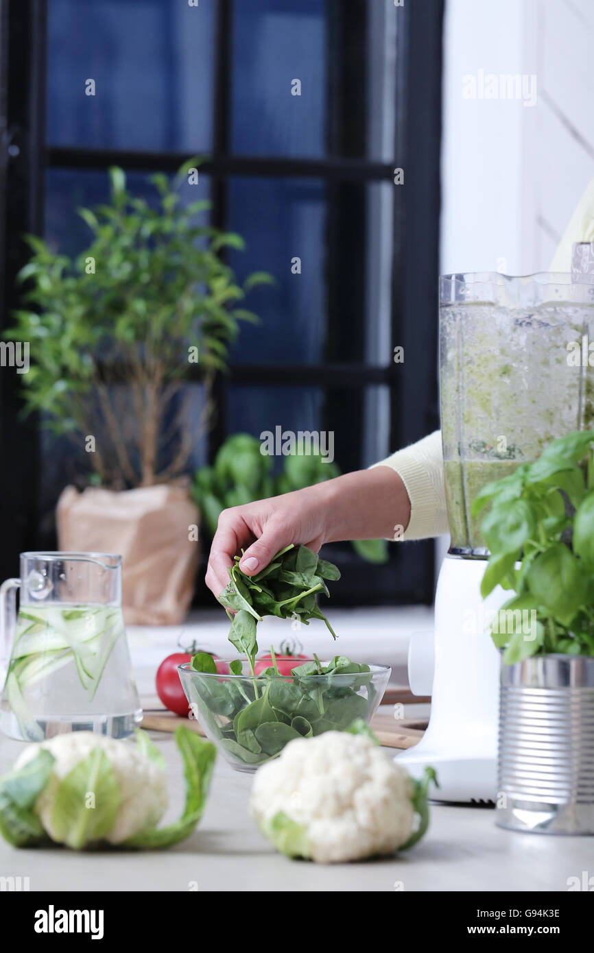 Woman cooking healthy food hi-res stock photography and images - Alamy
