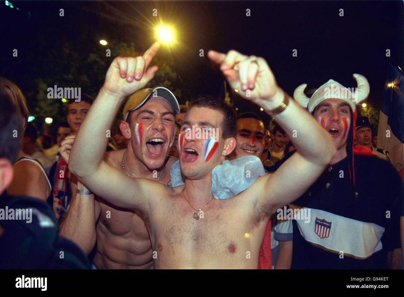 France fans celebrating on the Champs Elysees in Paris Stock Photo - Alamy