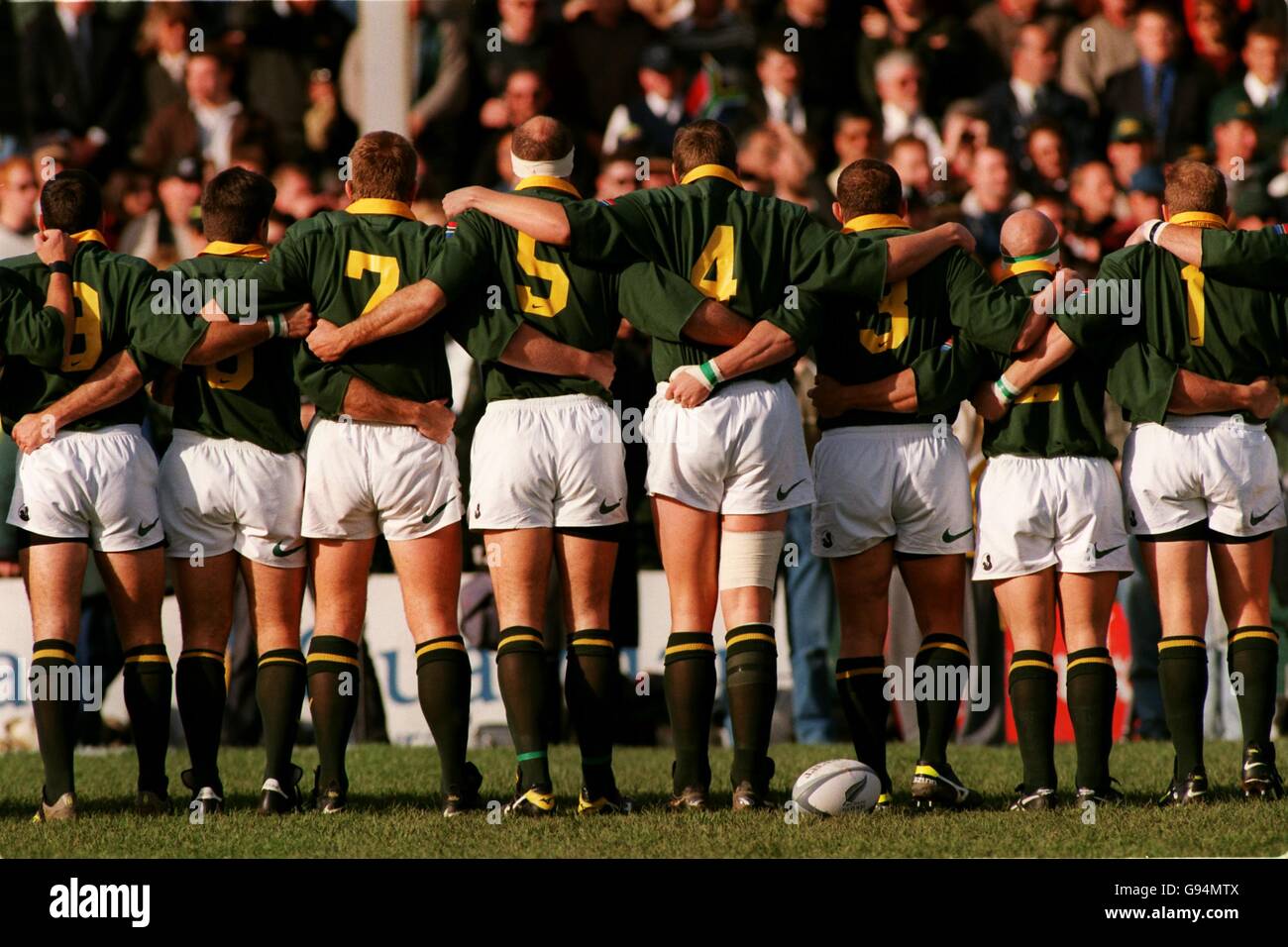 The South Africa team put their arms around each other's shoulders as ...