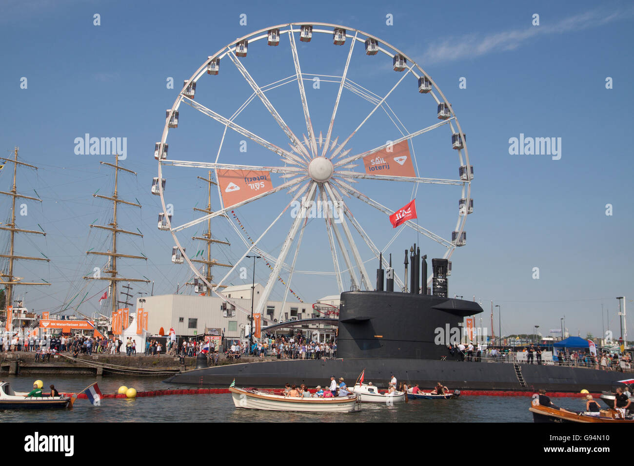 AMSTERDAM, THE NETHERLANDS, 20 AUGUST 2015 People sail in boats along ...