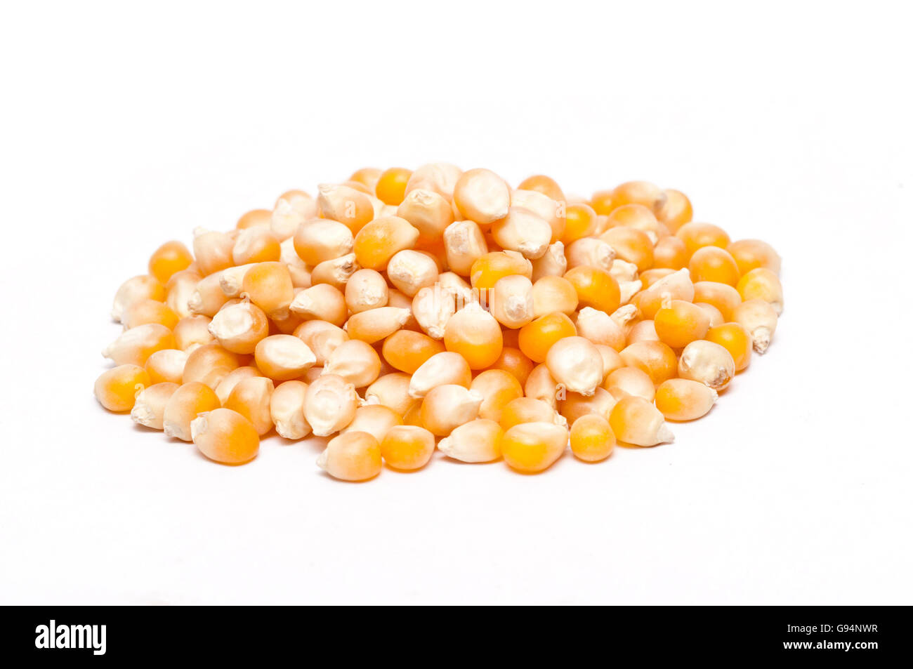 Popcorn Seeds Pile on White Stock Photo - Alamy