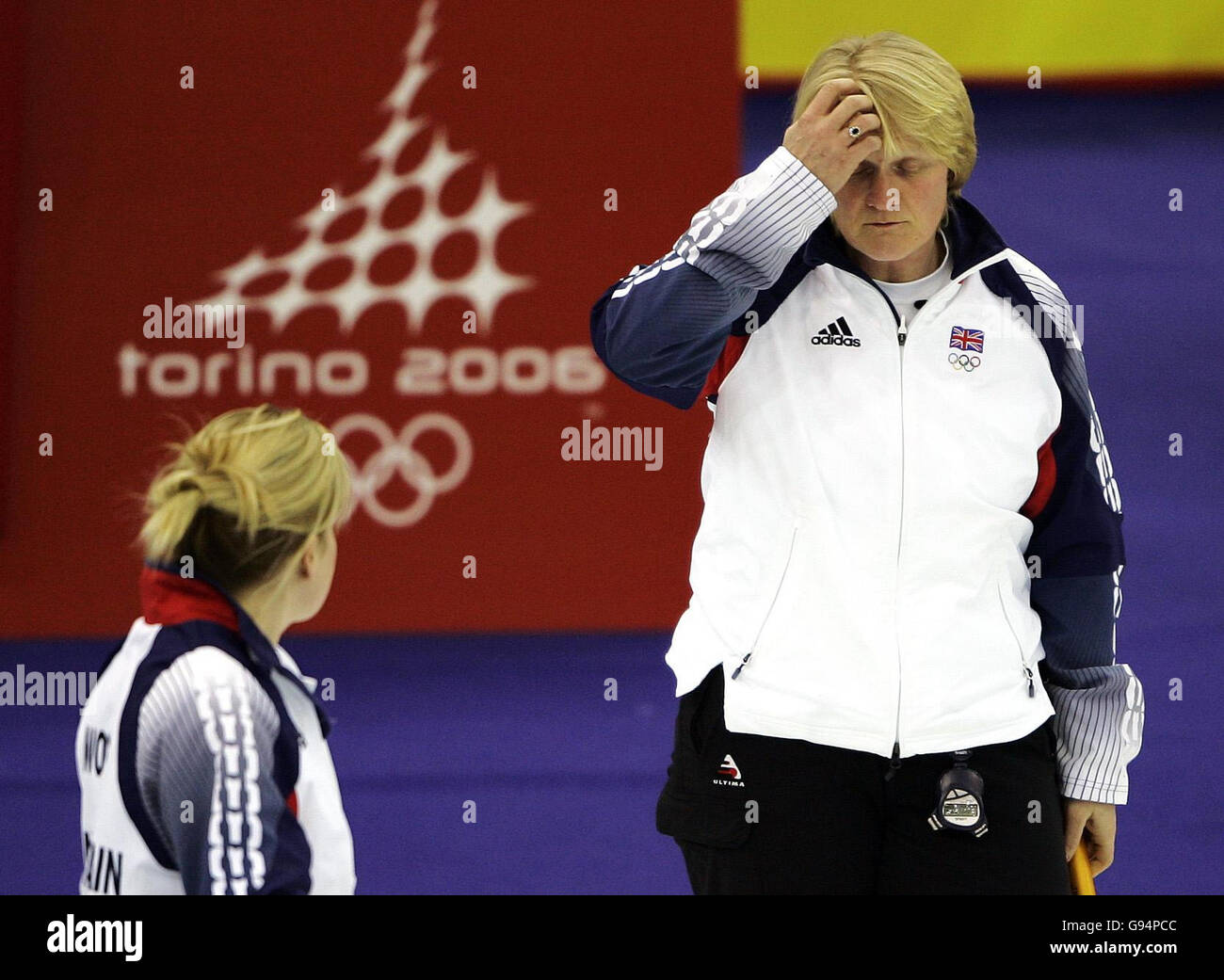 Great Britain's Rhona Martin and Kelly Wood (L) stand dejected after ...