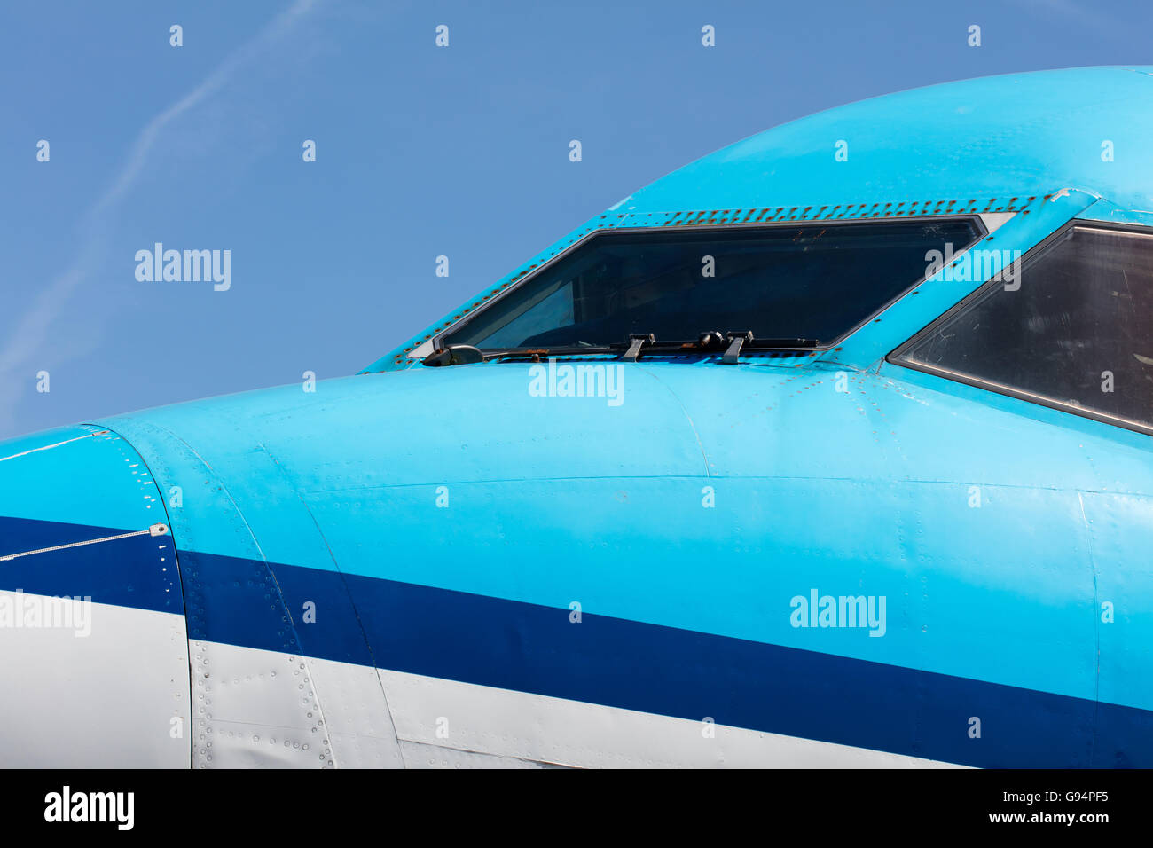 Cockpit close up of blue jet airplane Stock Photo - Alamy