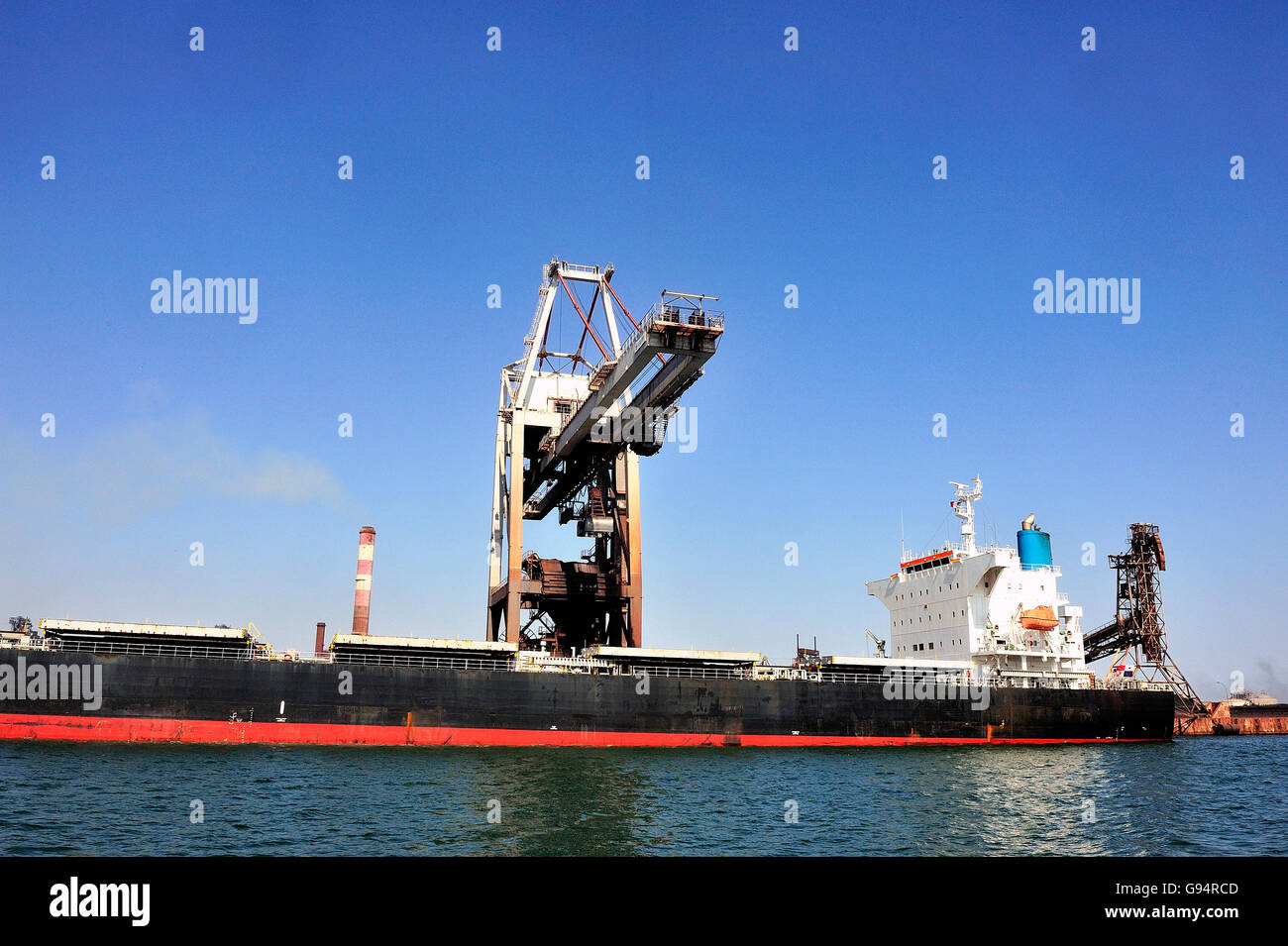 unloading of an ore cargo liner for the steel-works at Fos-sur-Mer ...